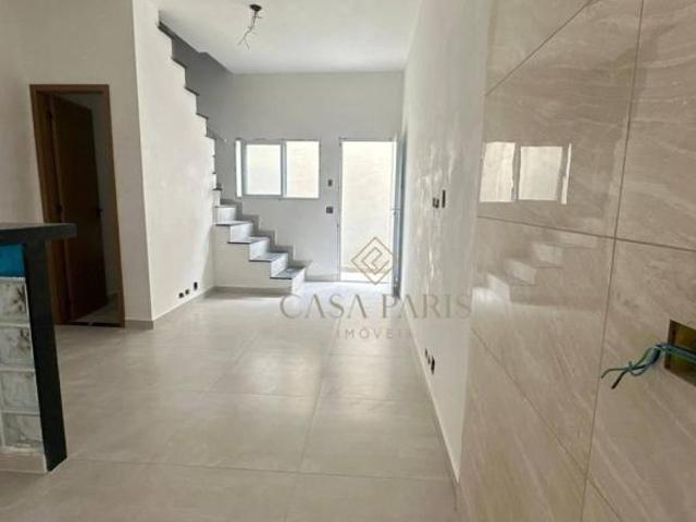 Sobrado de condomínio com 2 dormitórios à venda, 51 m² por R$ 380.000 Aviação Praia Grande/SP