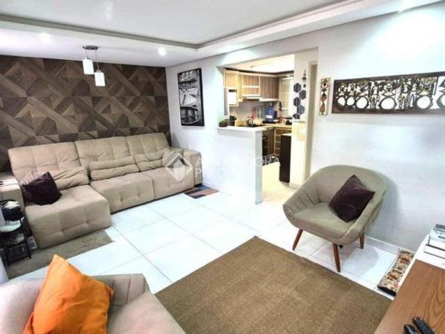 Casa em condomínio com 3 quartos e 2 vagas de garagem no Bairro Igara em Canoas