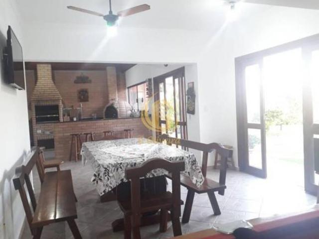 Sobrado em condomínio à venda, 6 quartos, 4 suítes, A/C393m² A/T 1.024m2