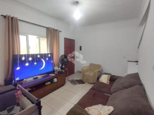 Sobrado em condominio a venda na Praia grande, bairro mirim com 2 quartos e 1 vaga