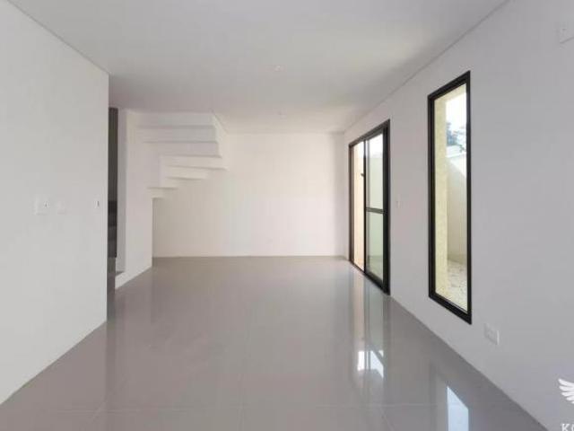 Sobrado em condomínio em SANTA FELICIDADE com 129,30m²