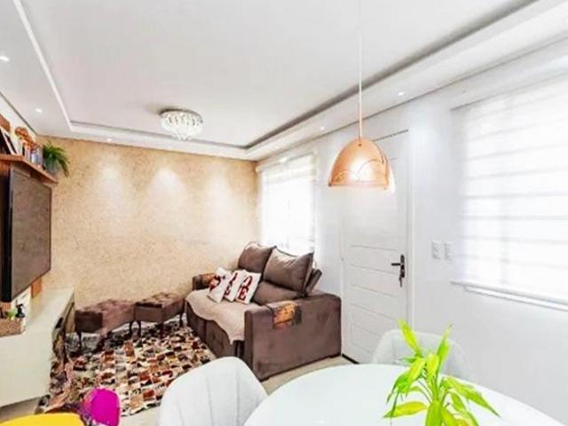 Sobrado em condomínio fechado 108m² 03 dormitórios 02 vagas cobertas no Bairro Igara, em Canoas