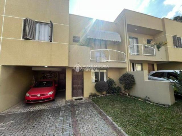 Sobrado em condomínio fechado com 3 suítes no bairro Água Verde em Curitiba/PR