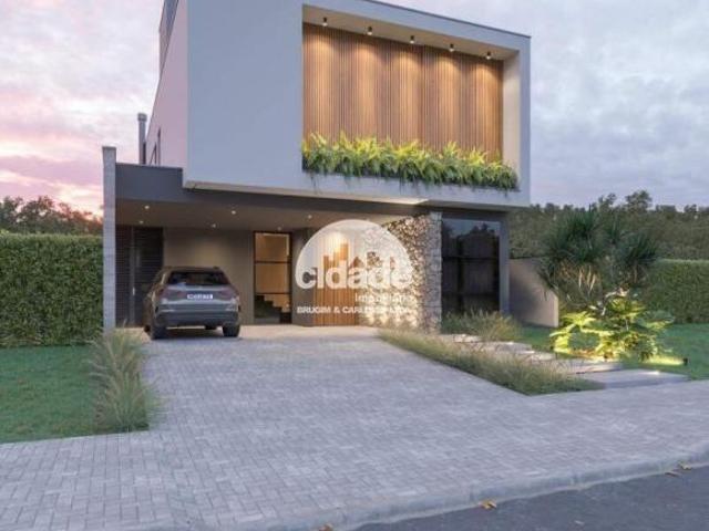 Sobrado em condomínio fechado com 4 suítes, design moderno e conforto absoluto