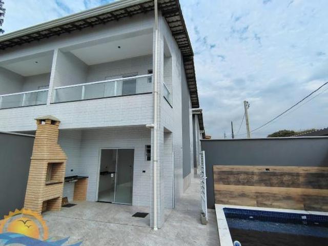 Sobrado em Condomínio frente ao mar em Itanhaém SP 2 Quartos, 2 Banheiros, 1 Vaga de Garagem, pisc