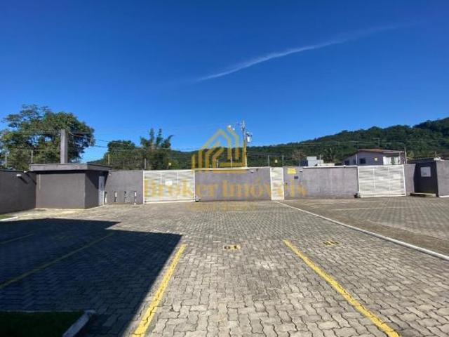 Sobrado em Condomínio na Massaguaçu à 800 mettros da praia no Jardim do Sol