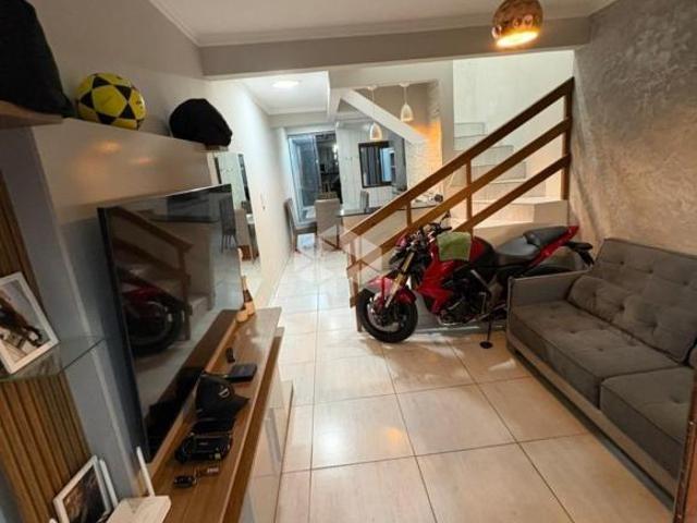Sobrado em Tramandai, vaga de garagem, localização previlegiada