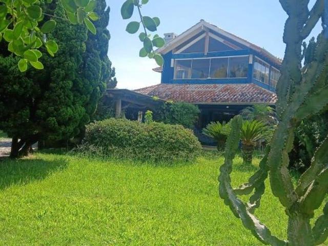 Sobrado em 4 terrenos em Xangri Lá