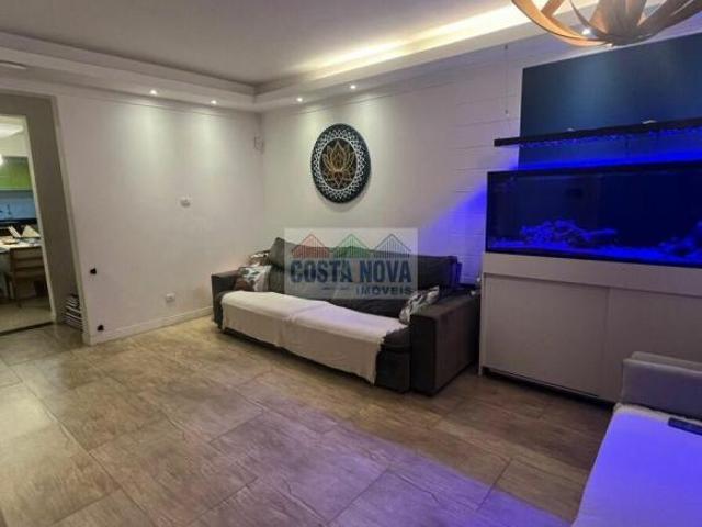 Sobrado espaçoso a 750m da praia, com área gourmet e localização excelente