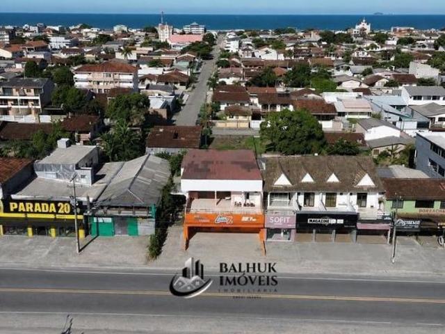 Sobrado frente para Rodovia com sala comercial