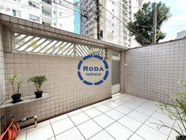 Sobrado geminado no Macuco com 2 dormitórios e quintal