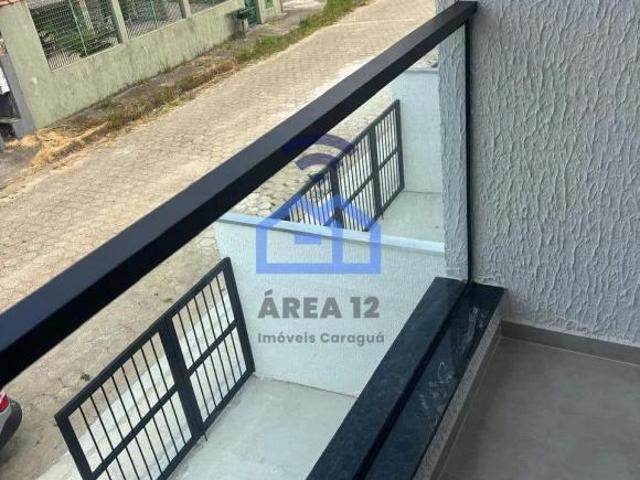 Casa à venda no bairro Massaguaçu em Caraguatatuba, SP