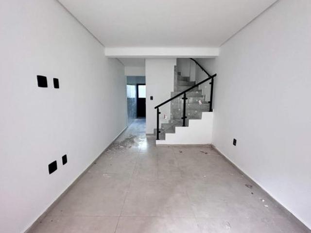 Sobrado geminado com 2 dormitórios à venda, 52 m² por R$ 330.000 Tude Bastos Praia Grande/SP
