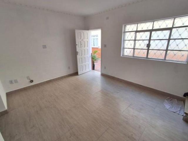 Sobrado geminado com 2 dormitórios, suite e quintal