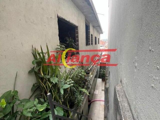 sobrado Imirim com 2 casas no terreno individuais, com duas vagas de garagem