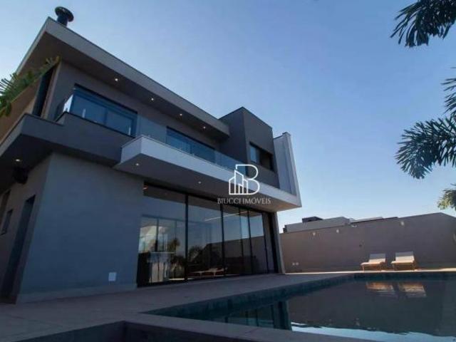 Sobrado para venda em Condomínio Arborais de 325.00m² com 5 Quartos, 4 Suites e 4 Garagens