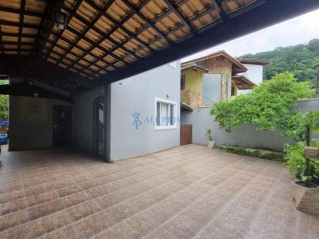 Sobrado para venda em Canto Do Forte de 200.00m² com 3 Quartos, 1 Suite e 4 Garagens
