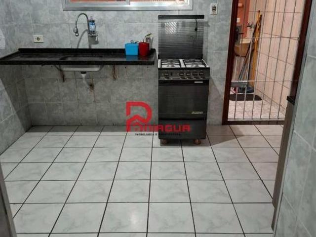 Sobrado para venda em Guilhermina de 117.00m² com 2 Quartos, 1 Suite e 3 Garagens
