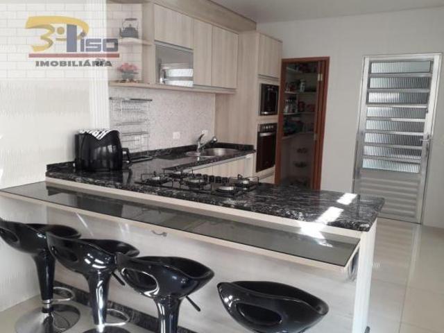 Sobrado para venda em Vila Guilhermina de 222.00m² com 3 Quartos, 1 Suite e 2 Garagens
