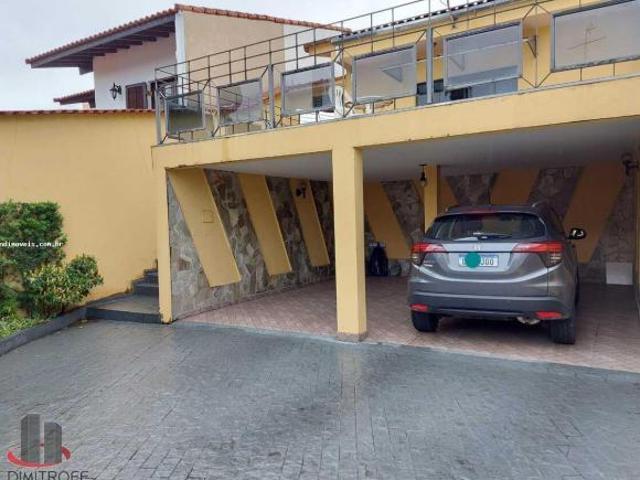 Sobrado para venda em Vila Oliveira de 317.00m² com 4 Quartos, 1 Suite e 4 Garagens