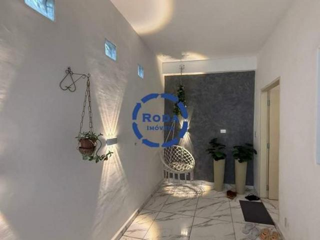 Sobrado residencial à venda no Macuco, em Santos, com 2 quartos e 2 vagas