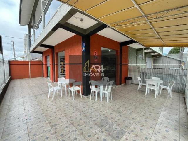 Sobrado Residencial e Comercial à venda no bairro Sitio Cercado em Curitiba PR