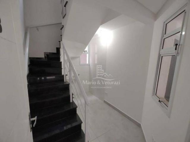Sobrado triplex com 2 dormitórios à venda, 94 m² por R$ 405.000,00 Vila Santa Rosa Guarujá/SP