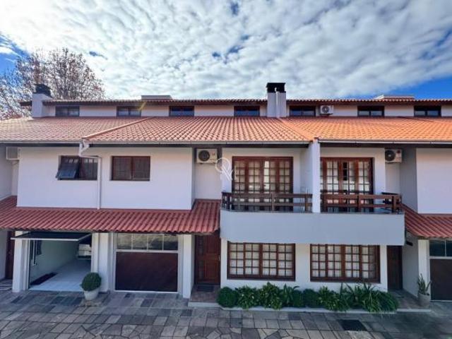 Sobrado triplex à venda no Jardim América