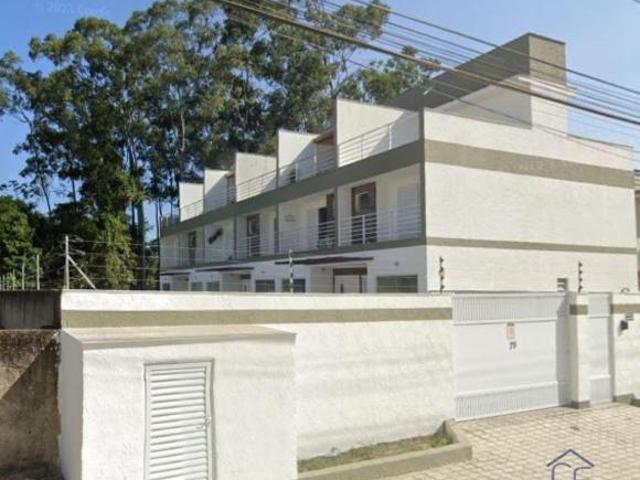 Sobrado triplex em condomínio fechado na Massaguaçú Caraguatatuba SP