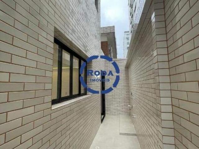 Sobrado triplex isolado na Ponta da Praia, 4 suítes, Piscina e 2 vagas