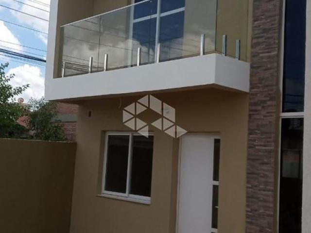 SOBRADO 02 dormitórios/quartos, sacada, pátio e box estacionamento