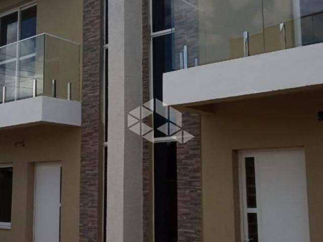 SOBRADO 02 dormitórios/quartos, sacada, pátio e box estacionamento