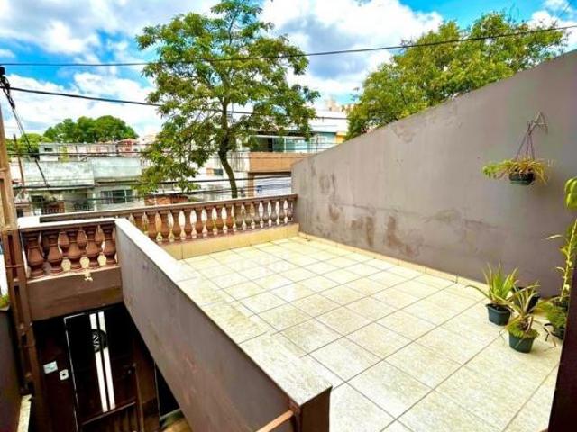 Sobrado 120m2 à venda com 2 Dormitórios, varanda, quintal com churrasqueira, vaga coberta no Bairro