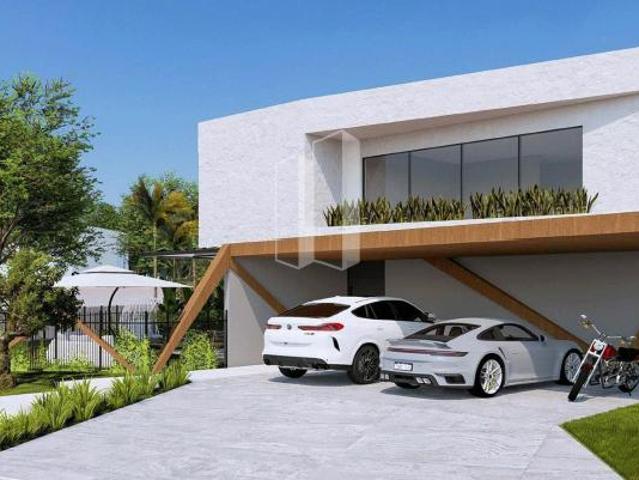 Sobrado 387 m² com 5 suítes, área de lazer completa e tecnologia no Jardins F.