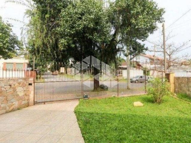 Sobrado 335,50m² 3 dormitórios 1 suíte 5 vagas, no Bairro Nossa Senhora das Graças em Canoas
