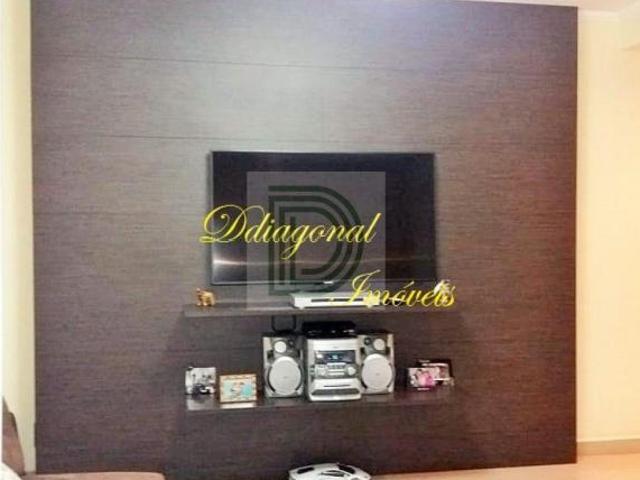 Sobrado 3 dormitórios, sendo 1 suíte, 4 vagas de garagem Jardim Esther