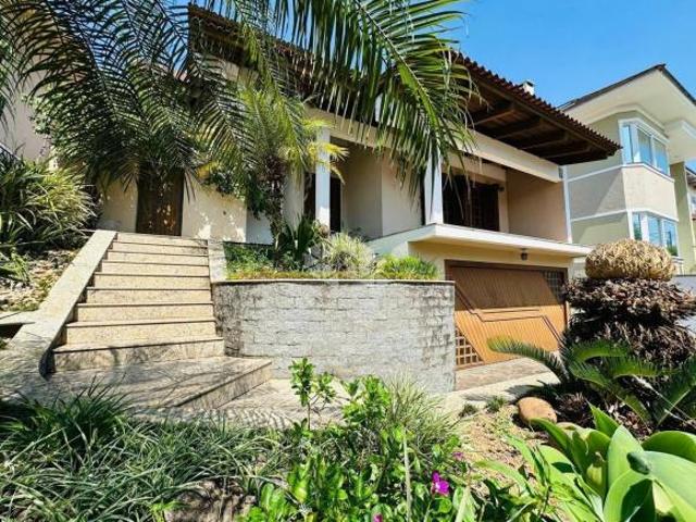 Sobrado 4 dormitórios, suíte, sacada e piscina Cidade Nova Canoas
