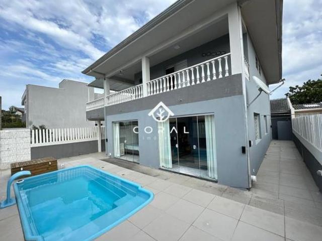 Sobrado 4 dormiitórios e piscina faixa mar