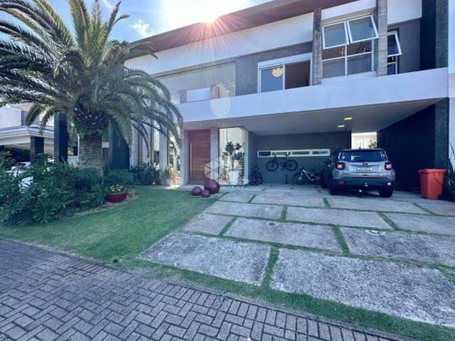 Sobrado 5 suites condominio fechado Capão da Canoa rRS