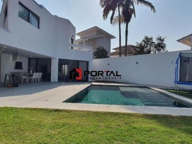 Sofisticação e Exclusividade: Casa de Luxo com 6 Suítes e Tecnologia Integrada!