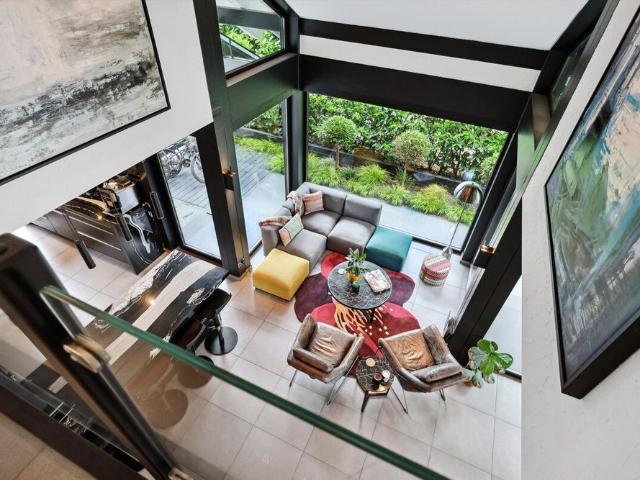 SOLE AGENT* A modern designed Keital Haus set in a large mature garden, set behind gates and with a studio in the garden and sauna