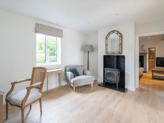 SOLE AGENT* An impressive four bedroom semi detached house with exceptional views, overlooking the Surrey Hills