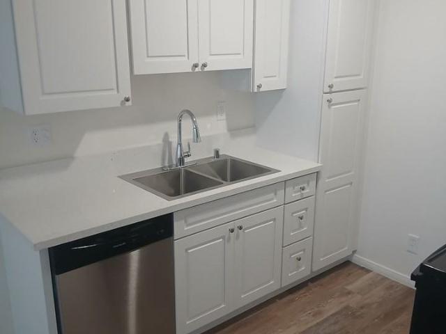 Small Garden Style Community in the Heart of Garden Grove 2 Bedroom Apartment for Rent at 11450 Lampson Ave, Garden Grove, CA 92840