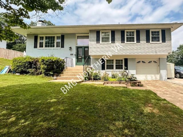Spacious 4 Bedroom 2.5 Bathroom Home with an Extensive Deck On A Large Private Lot In West Springfield