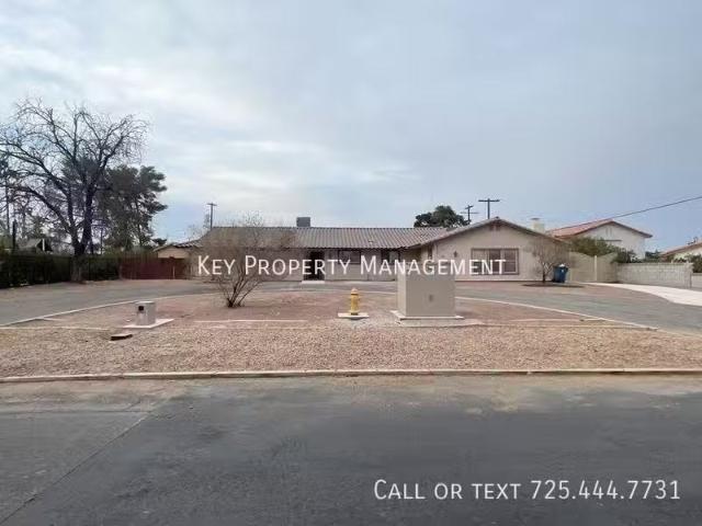 Spacious 5 bedroom, 2.5 bathroom home with fireplace, RV parki.