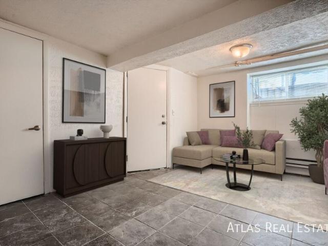 Spacious 2 Bedroom, 1 Bath, Basement Level Apartment in Aurora, Rent includes water, sewer, and trash