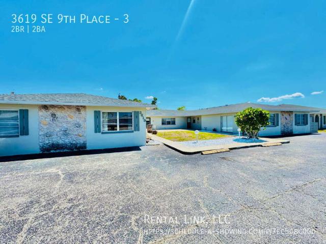 Comfortable 2 bedroom home with updated flooring, spacious outdoor area, and included lawn care and trash service