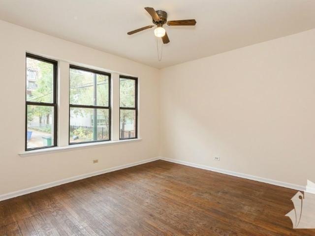 Spacious 3BR in Logan Square with Huge Kitchen & Hardwood Floors