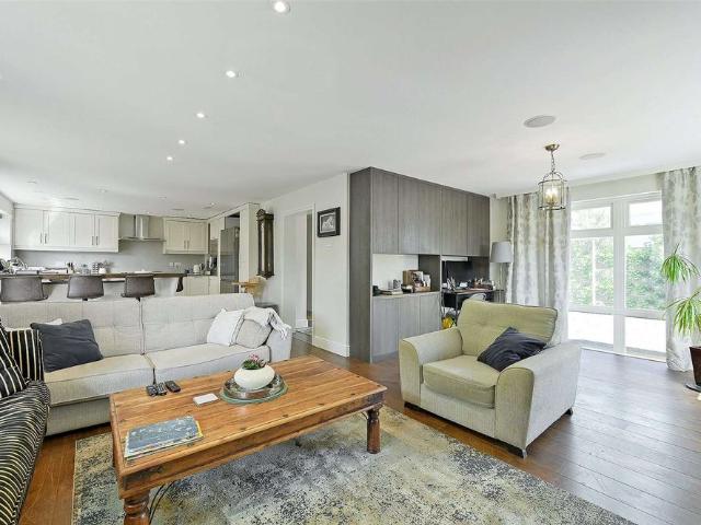 Spacious detached bungalow with generous garden, modern interiors and versatile living space