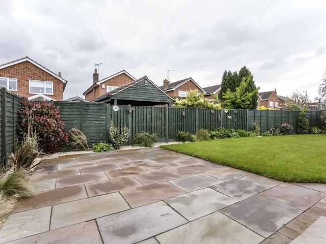 Spacious four/five bedroom detached family home in a desirable village between York and Wetherby tucked away in a quiet cul de sac